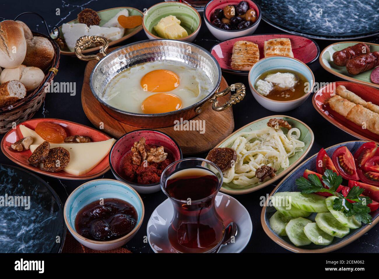 Restaurant concept; Traditional Turkish spreader breakfast on the black ...