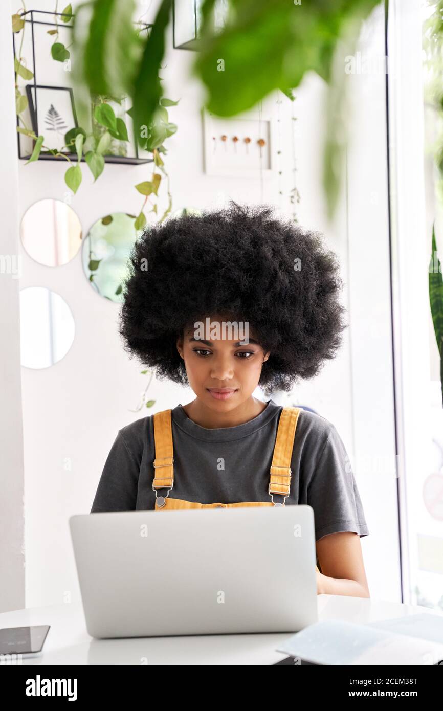 Black student using computer in hi-res stock photography and images - Alamy