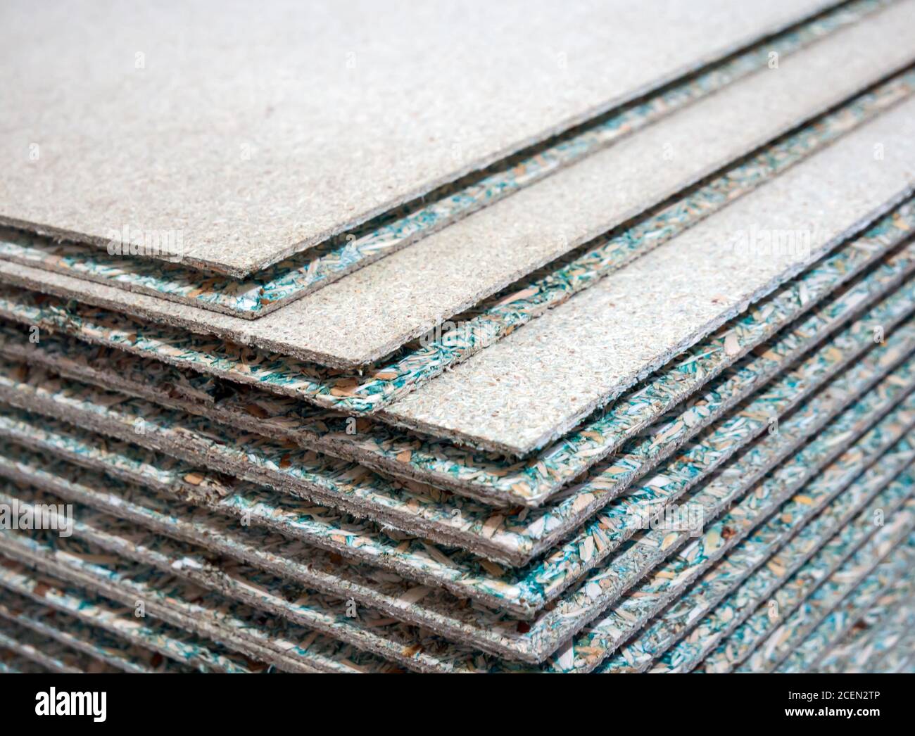 A stack of tongue-and-groove moisture resistant particle board Stock ...