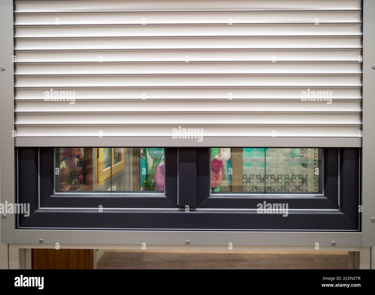 Roller shutters installed on a plastic window Stock Photo - Alamy