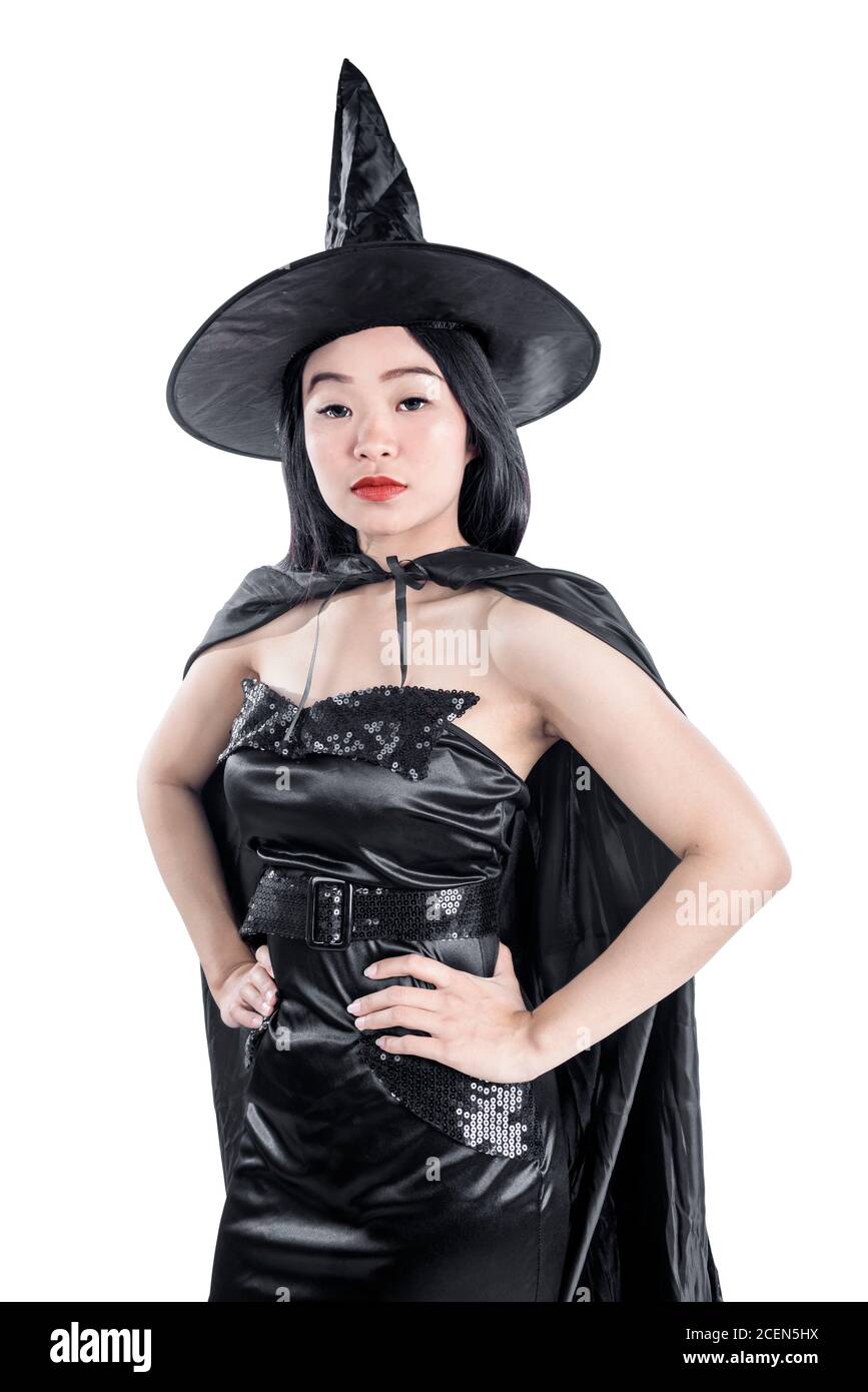 Asian witch woman with hat isolated over white background Stock Photo ...