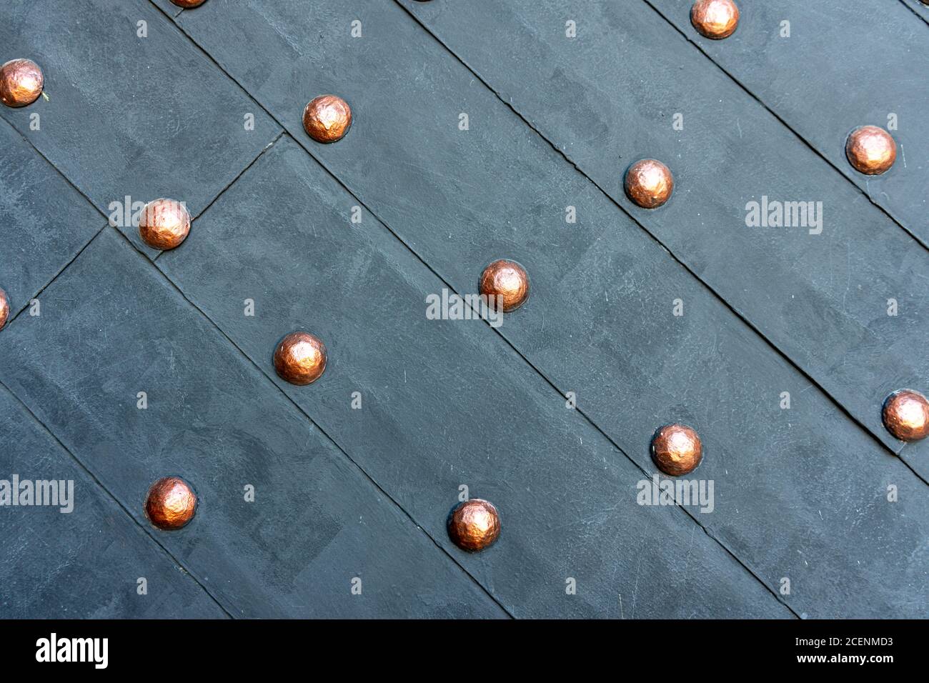 Old metal door with rivets Stock Photo - Alamy