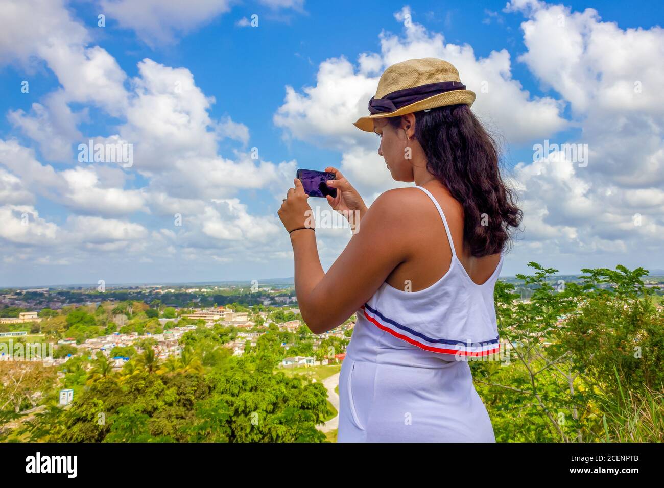 young girl photographing the landscape Stock Photo - Alamy