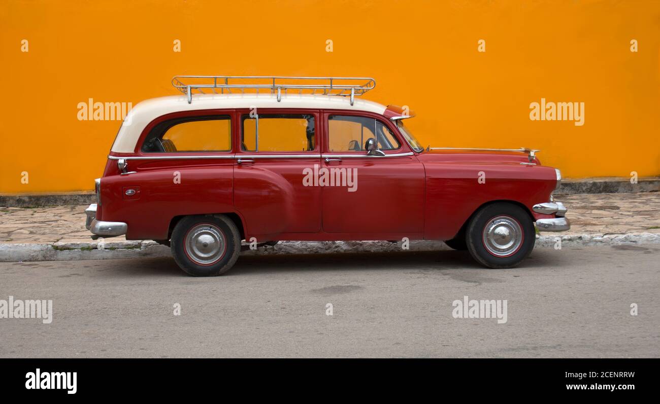 red old car on the street Stock Photo - Alamy