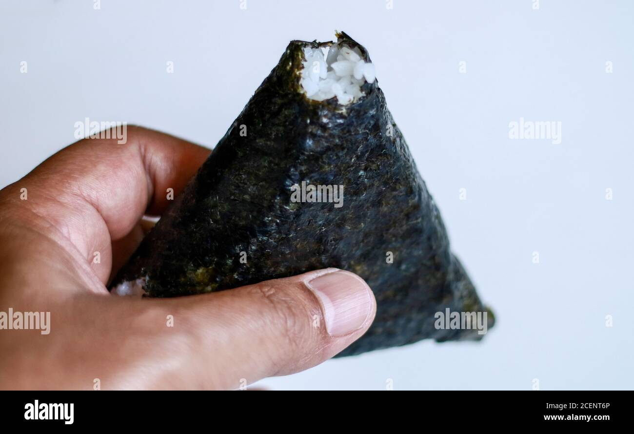 Onigiri hand hi-res stock photography and images - Alamy