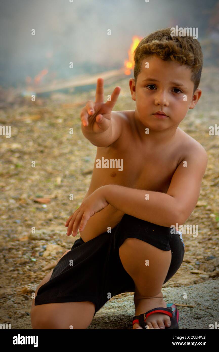 Boy with peace sign hi-res stock photography and images - Alamy