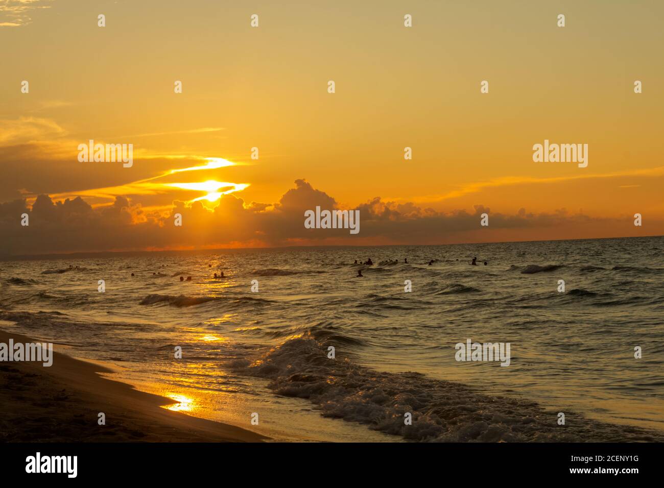 sunset at the beach Stock Photo - Alamy