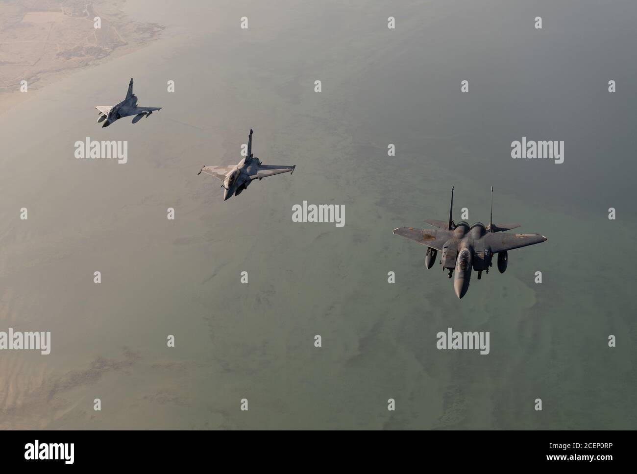 Qatari Emiri Air Force's (QEAF) Mirage 2000s and Rafales fly in ...