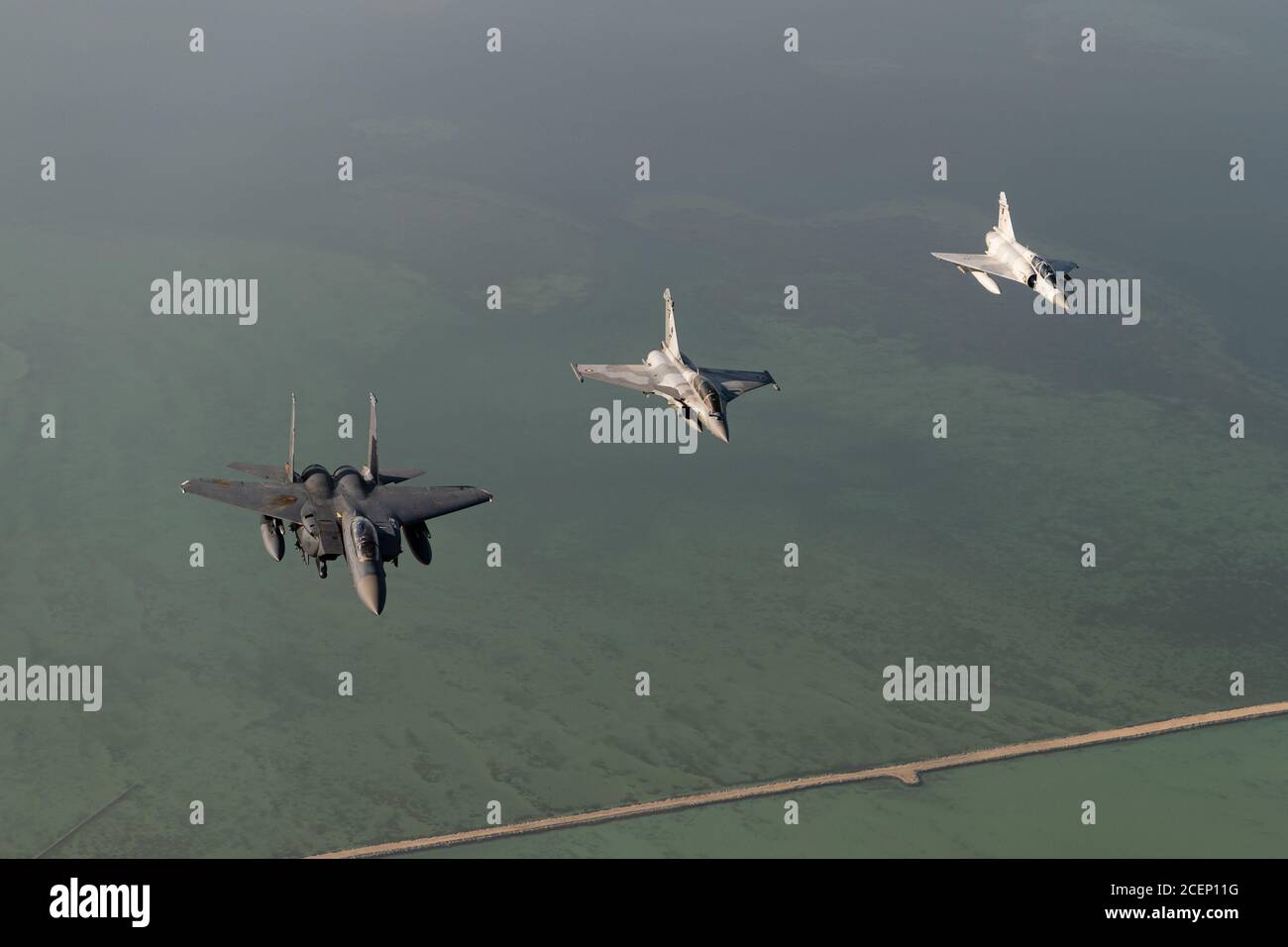 Qatari Emiri Air Force's (QEAF) Mirage 2000s and Rafales fly in ...