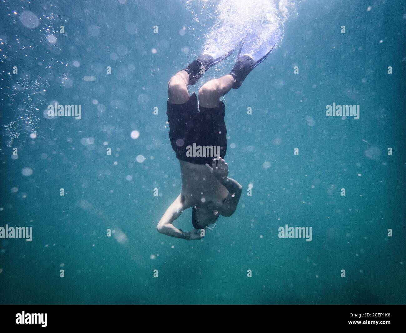 Boy Free Diving Swimming Down Tropical Reef Stock Photo - Alamy