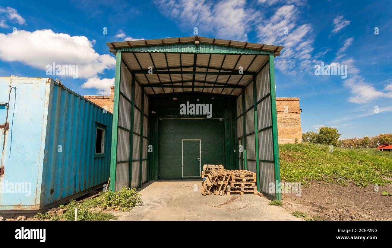 A large metal industrial warehouse for storing goods for storing goods ...