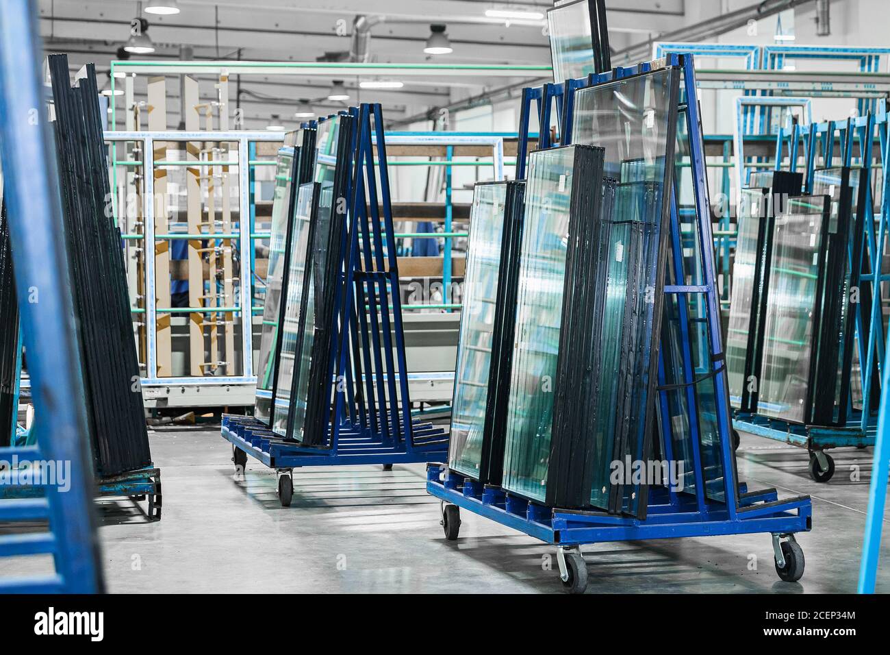 Production of plastic windows. On special trolleys for transportation ...