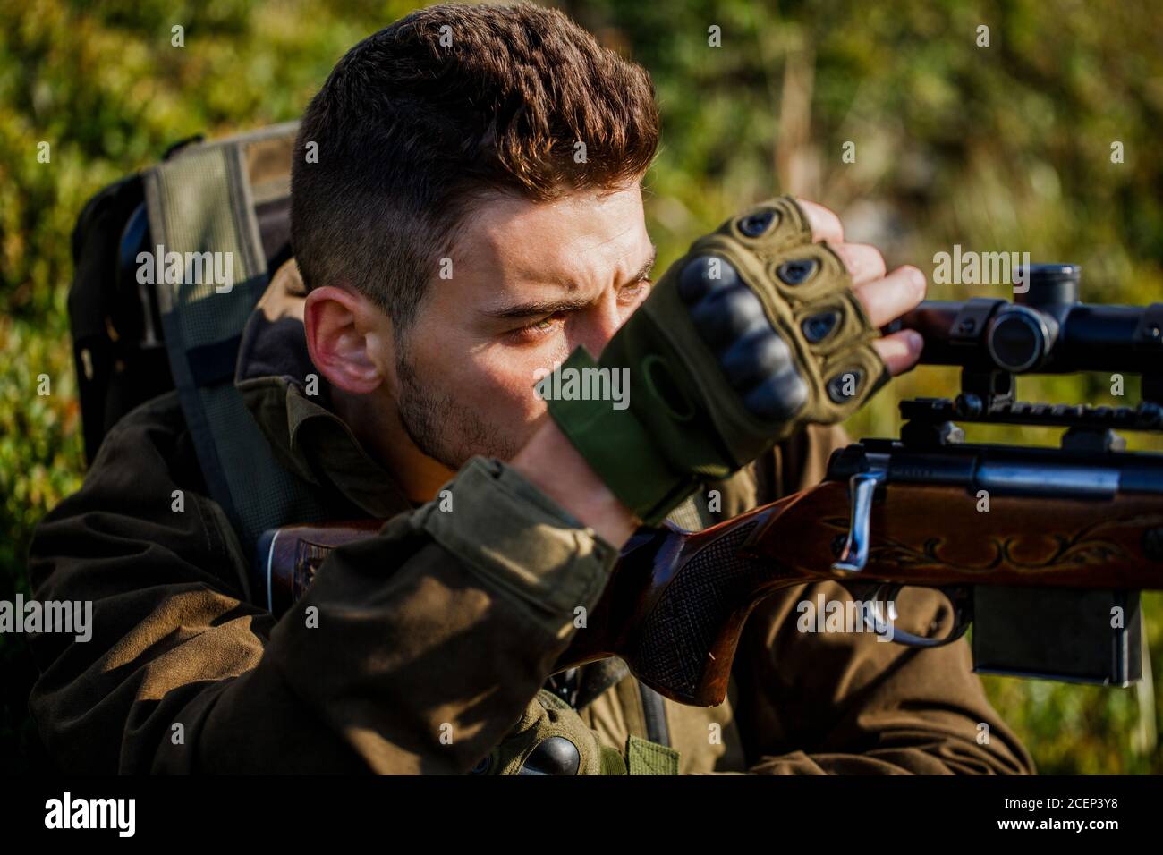 Man with shotgun at sunset hi-res stock photography and images - Alamy