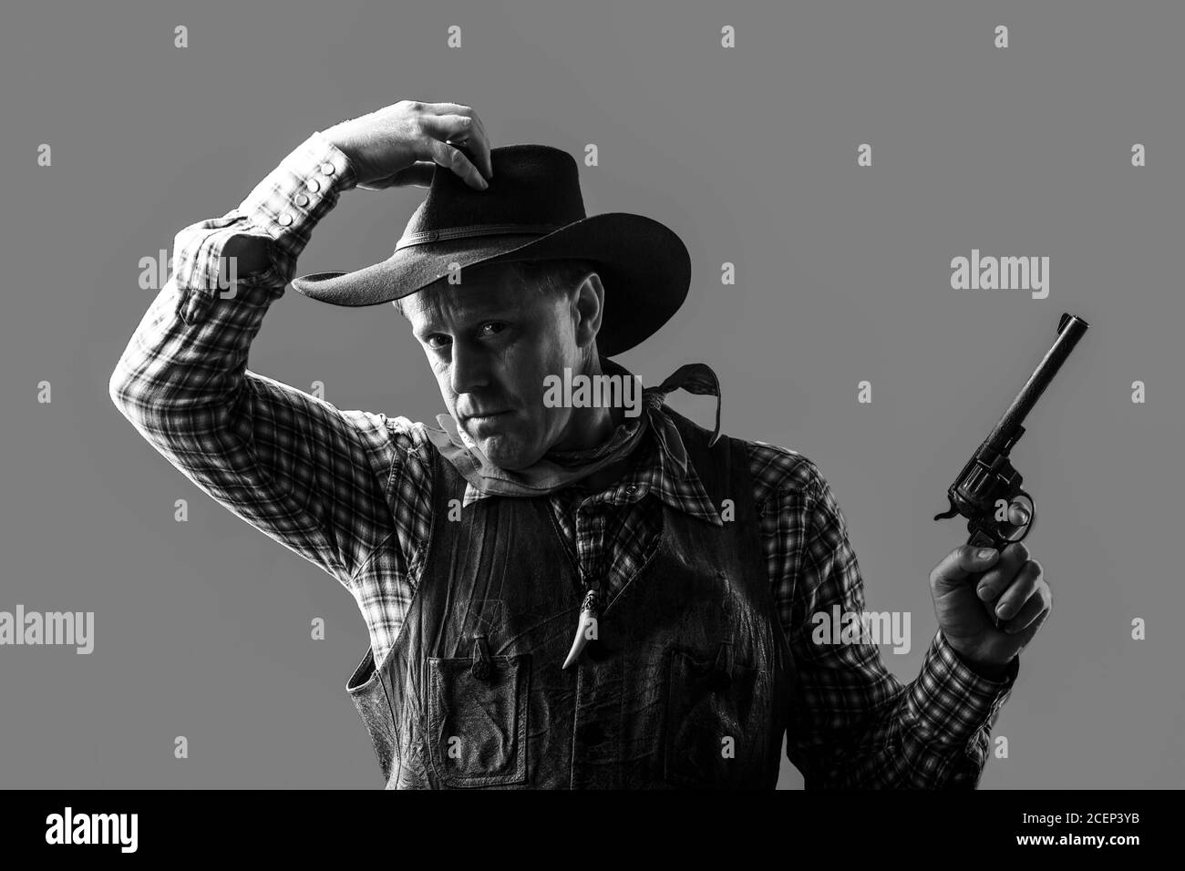 Portrait of a cowboy. American bandit in mask, western man with hat ...