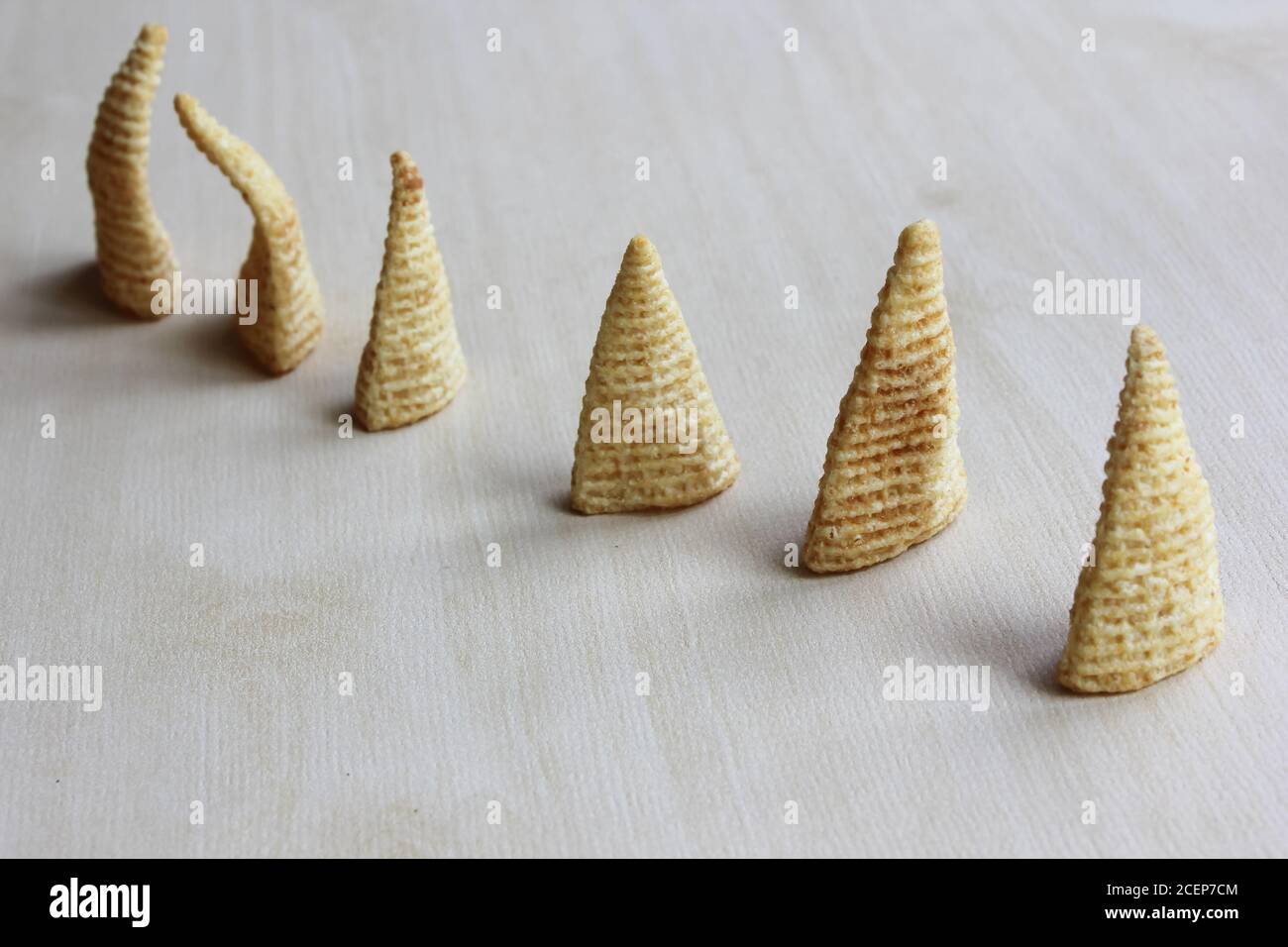 Cone of Corns Snack. Yellow, puffed Stock Photo - Alamy