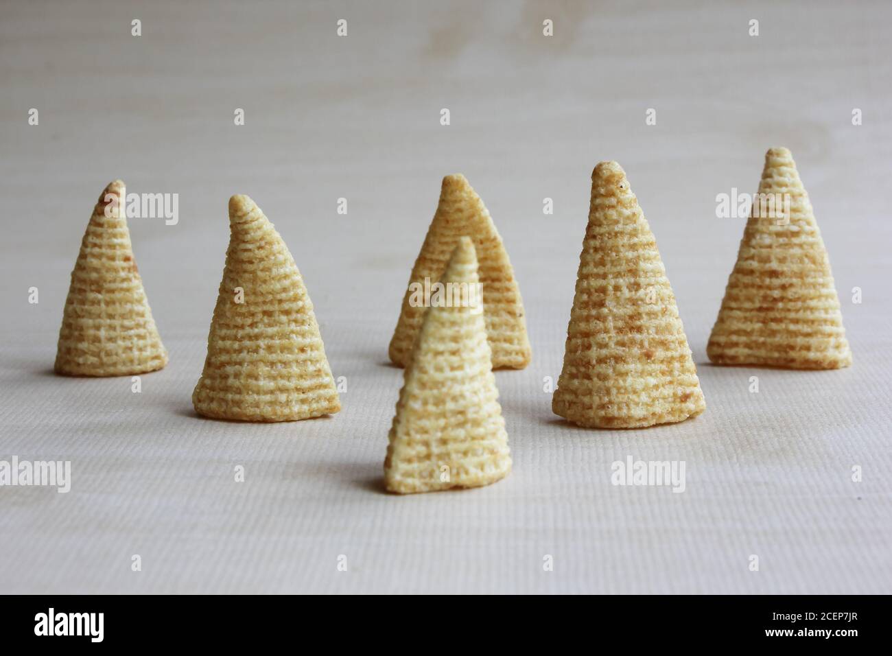 Cone of Corns Snack. Yellow, puffed Stock Photo - Alamy