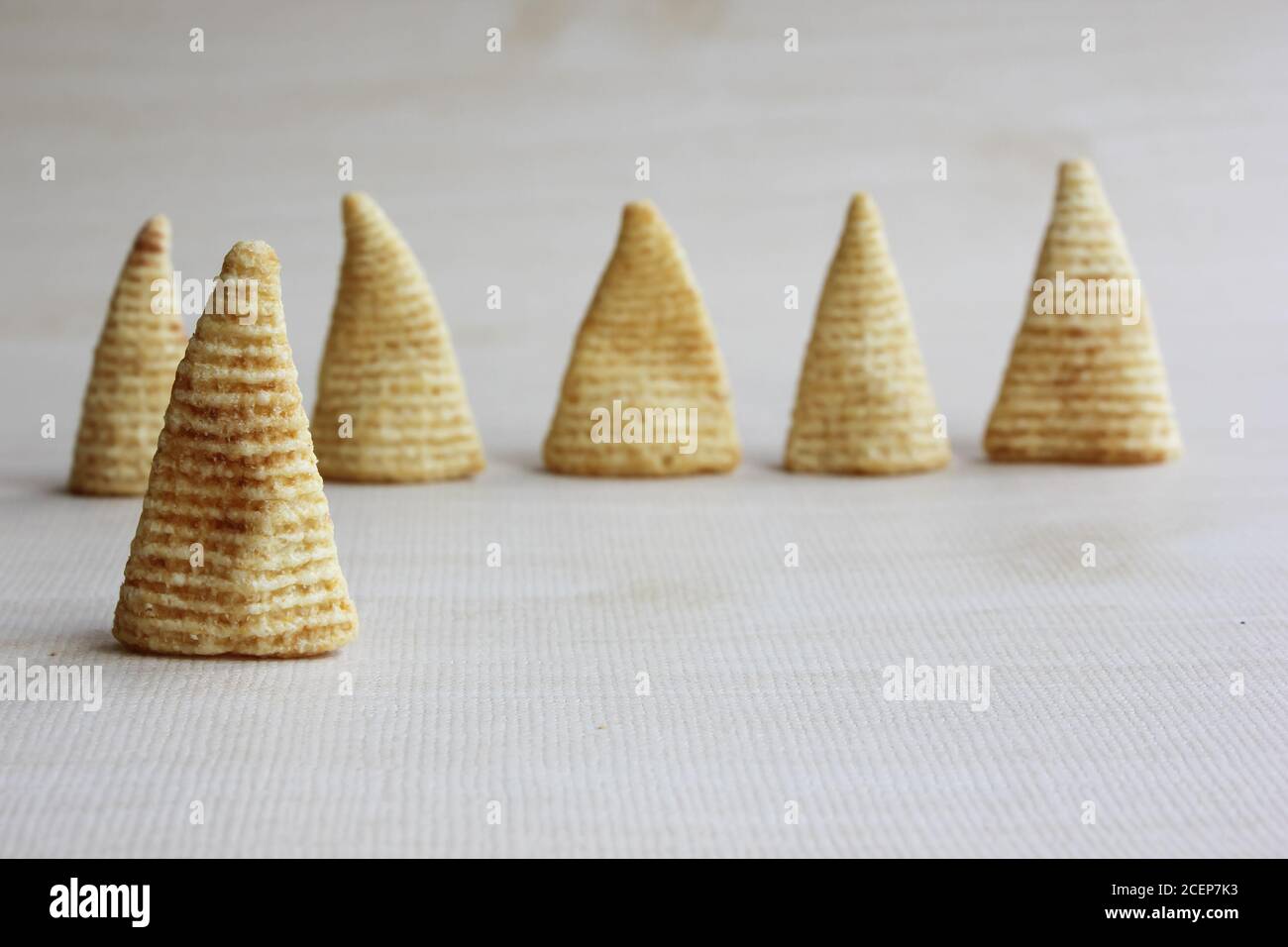 Cone of Corns Snack. Yellow, puffed Stock Photo - Alamy
