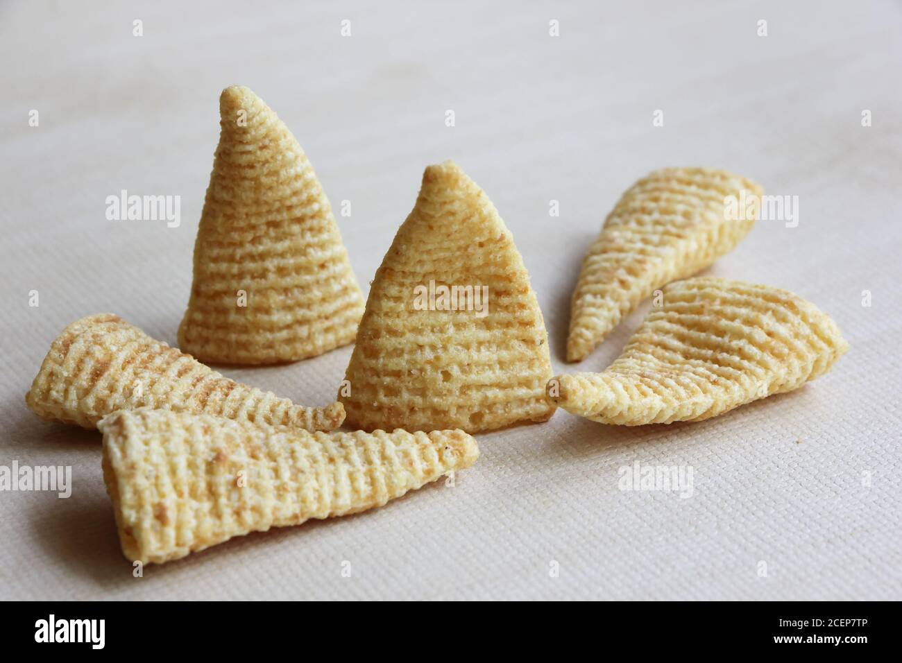 Cone of Corns Snack. Yellow, puffed Stock Photo - Alamy