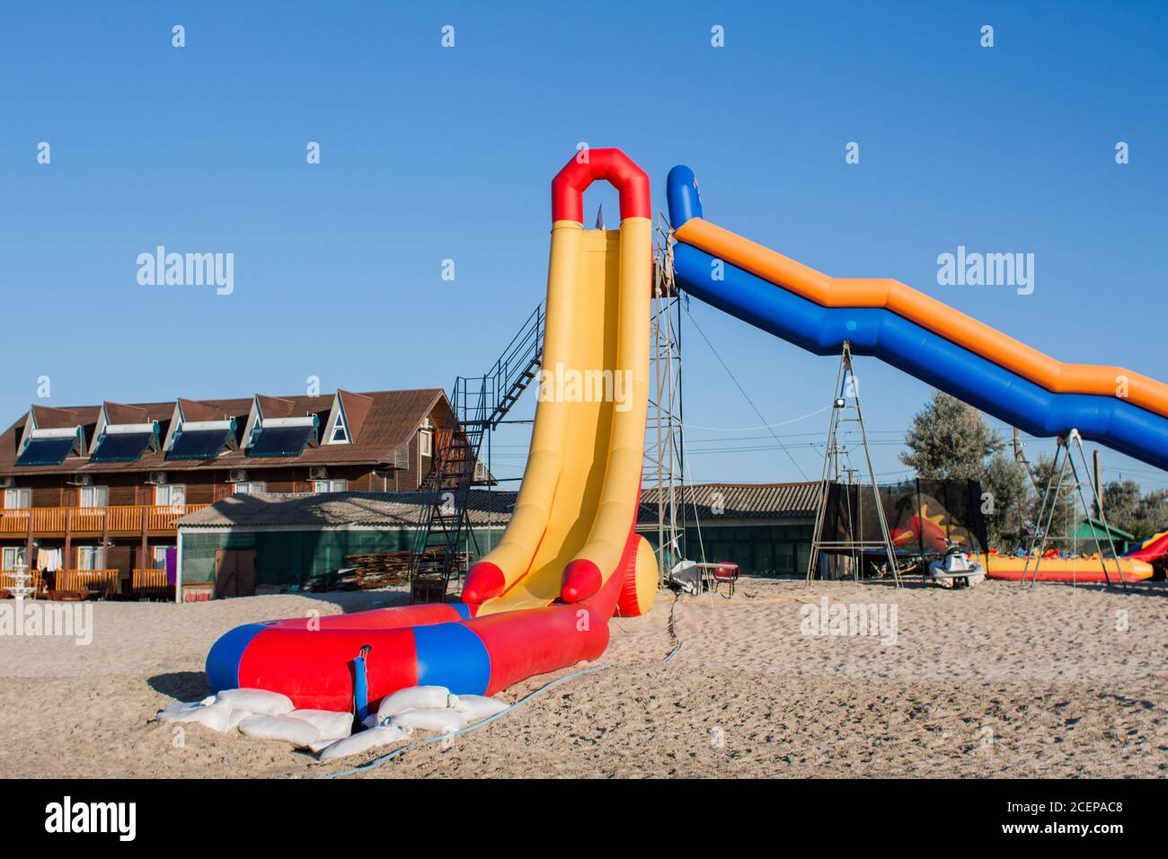 Inflatable water slides hi-res stock photography and images - Alamy