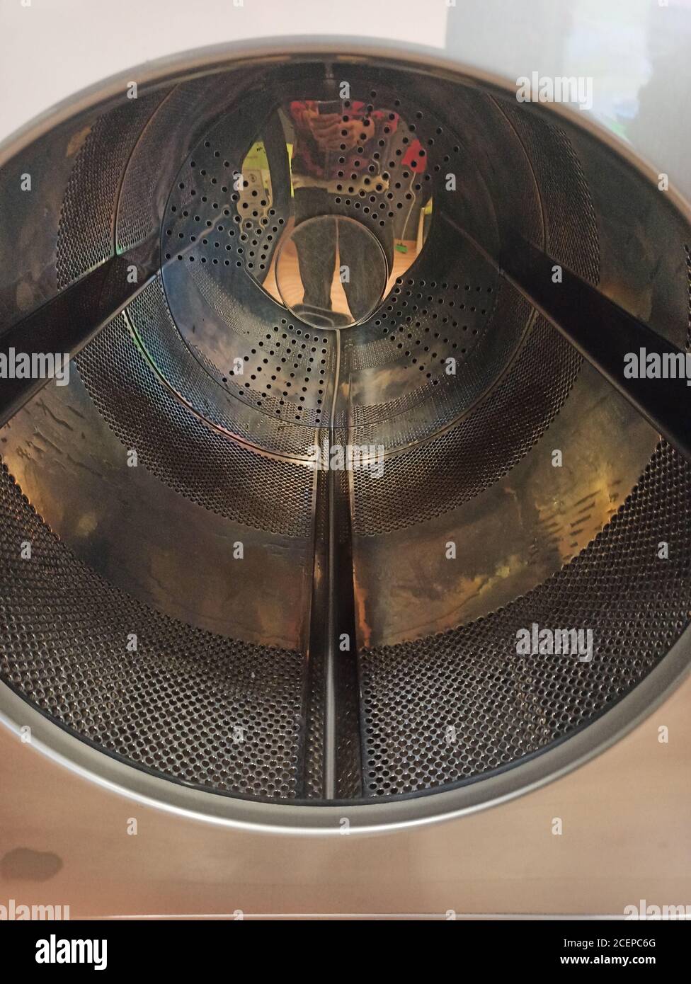Vertical shot of a washing machine inside Stock Photo - Alamy