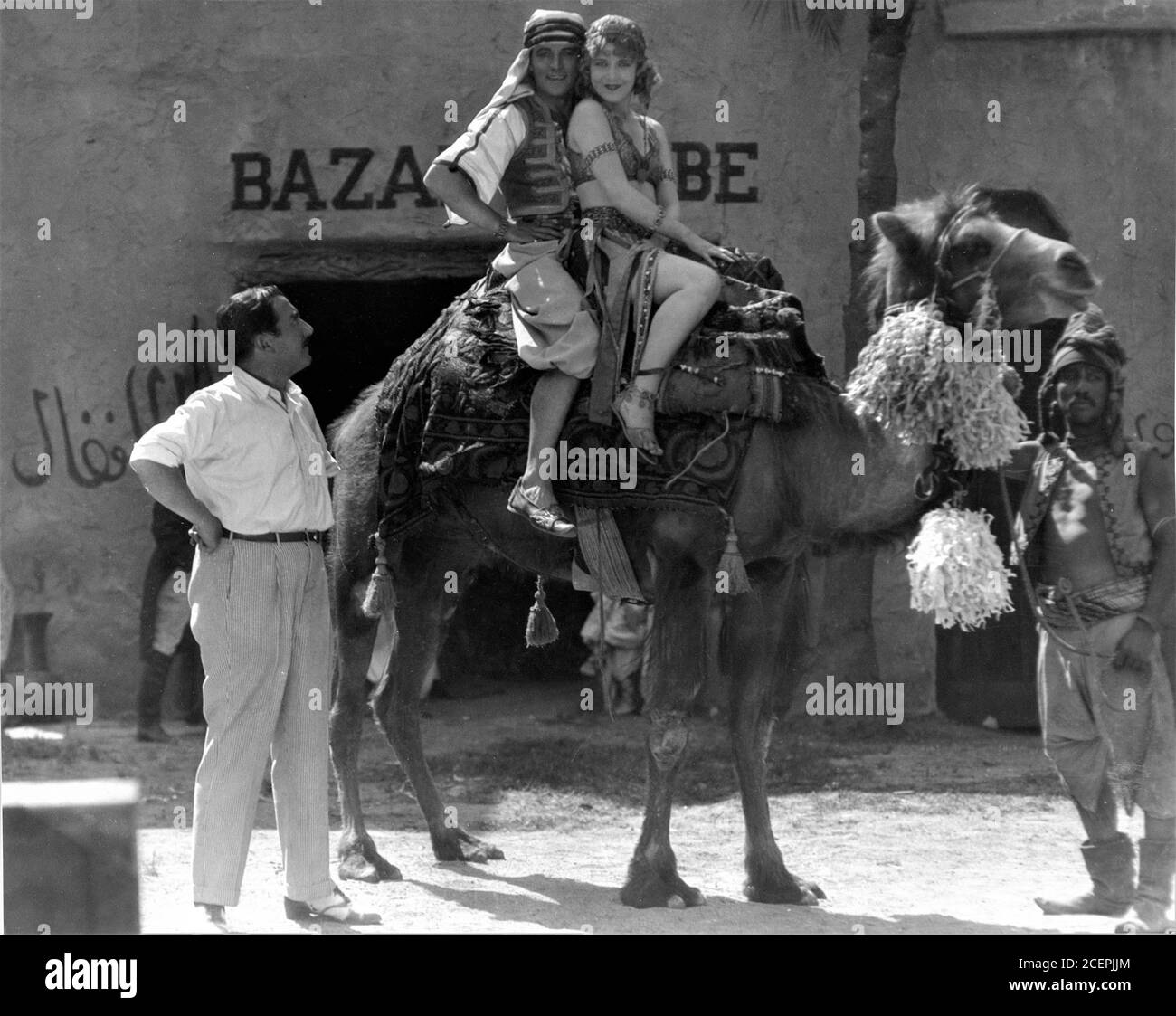 GEORGE FITZMAURICE RUDOLPH VALENTINO and VILMA BANKY on set candid ...