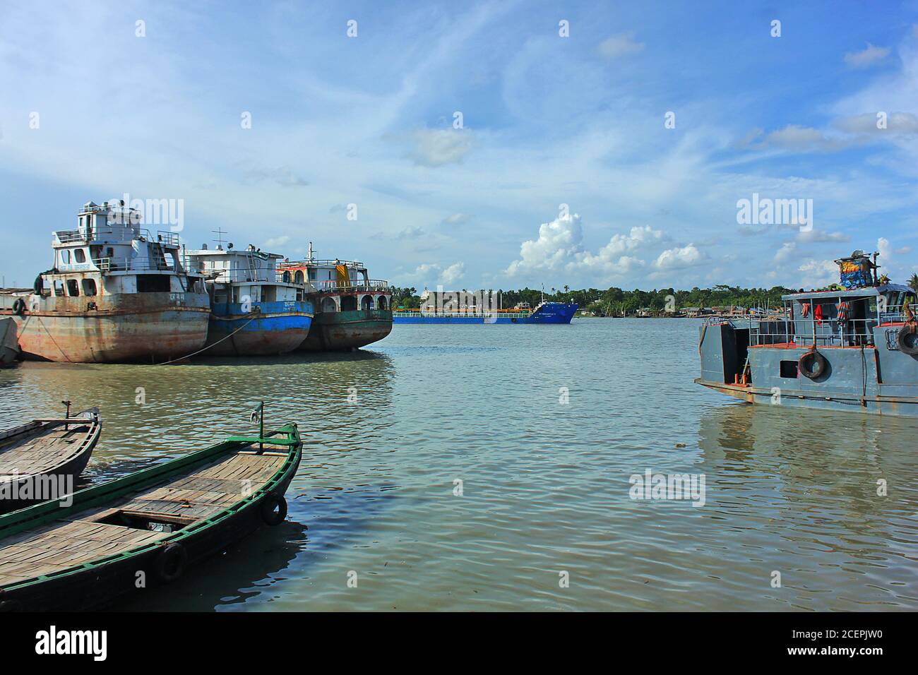 Cargo vessel anchored at the BIWT Ghat, Khulna, Bangladesh Stock Photo ...