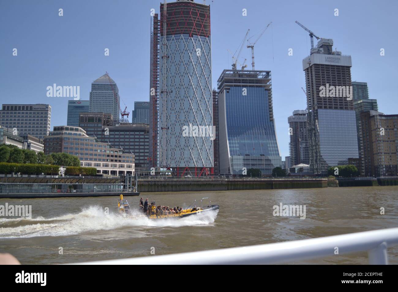 canary wharf, speedboat, River Thames London Stock Photo - Alamy