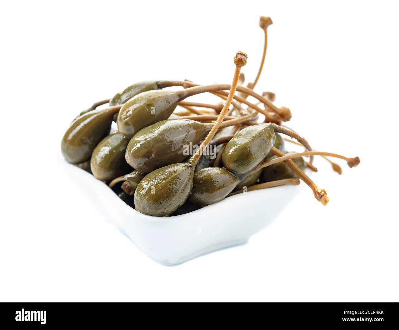 Pickled caper isolated on white background. Capparis pickled flower ...