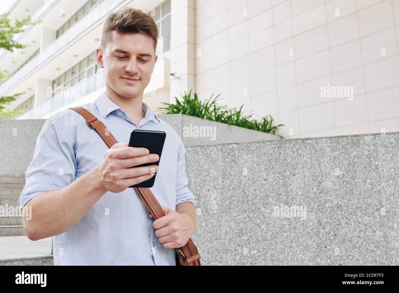Businessman checking text messages hi-res stock photography and images ...
