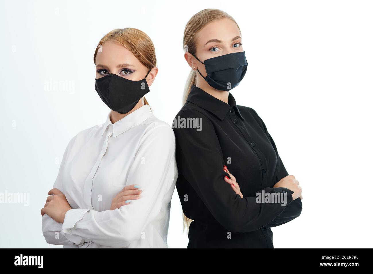 Young girls in protective mask with cross hands isolated on white ...