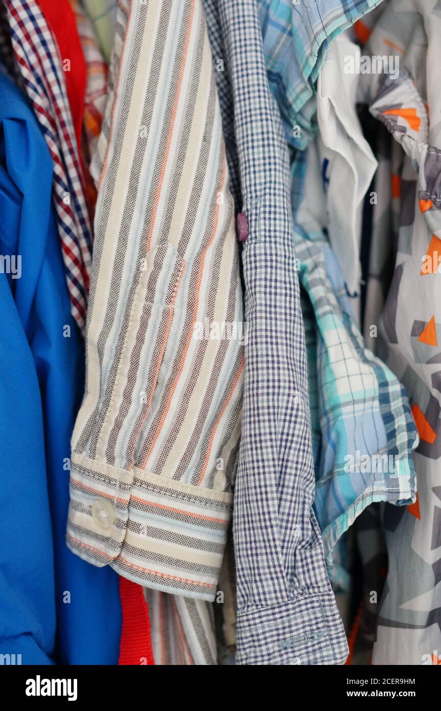 Clothes on a hangar hi-res stock photography and images - Alamy