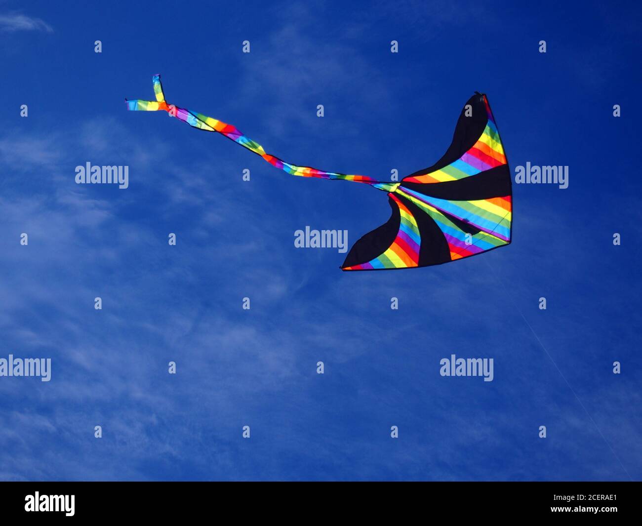 Colorful flying kite in the sky Stock Photo - Alamy