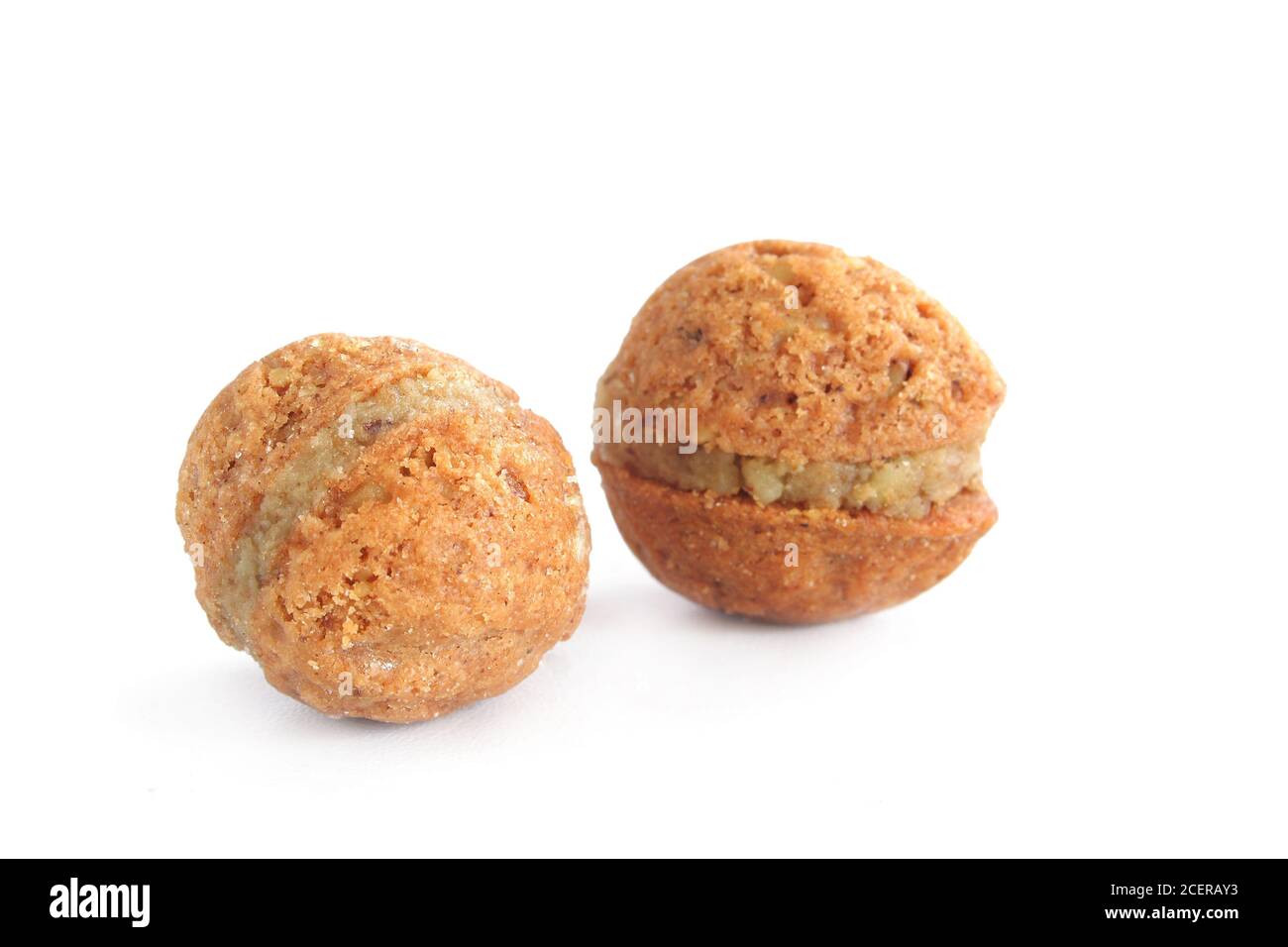 Walnut shaped cookie isolated on white background Stock Photo - Alamy