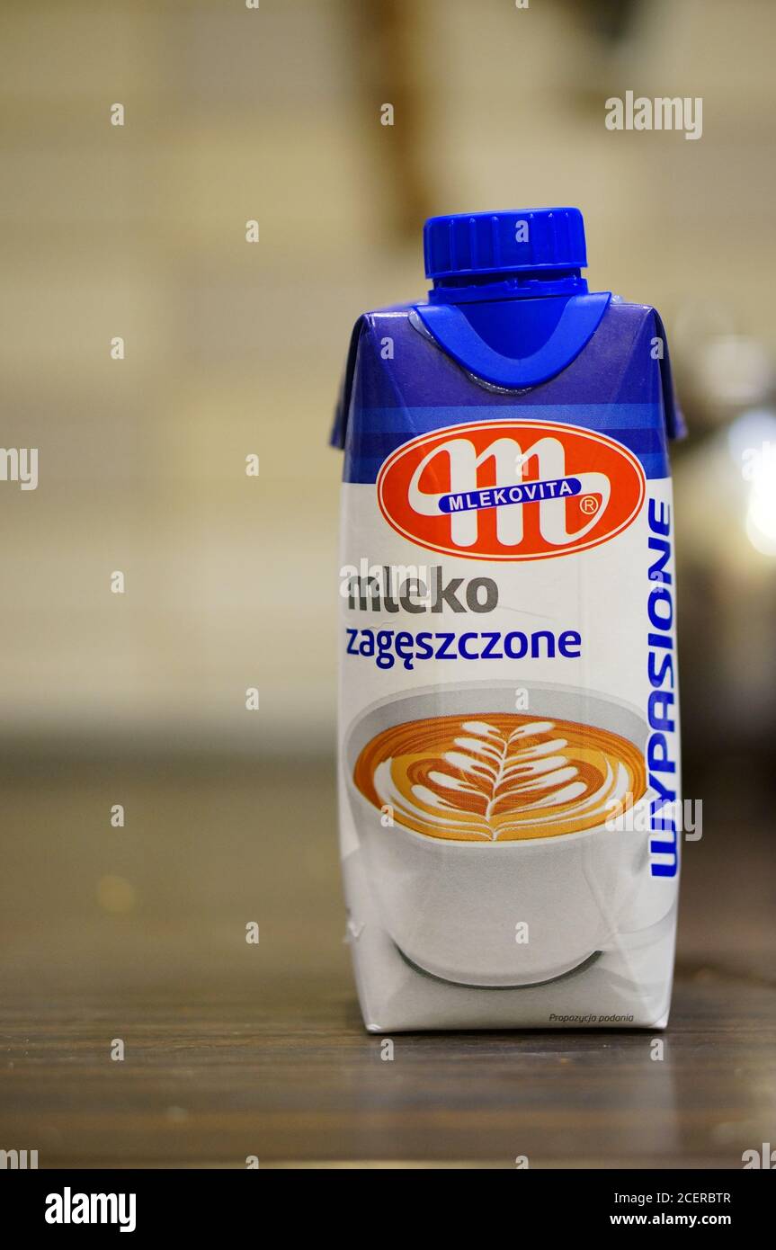 POZNA, POLAND - Aug 31, 2020: Polish Mlekovita condensed milk in a pack ...
