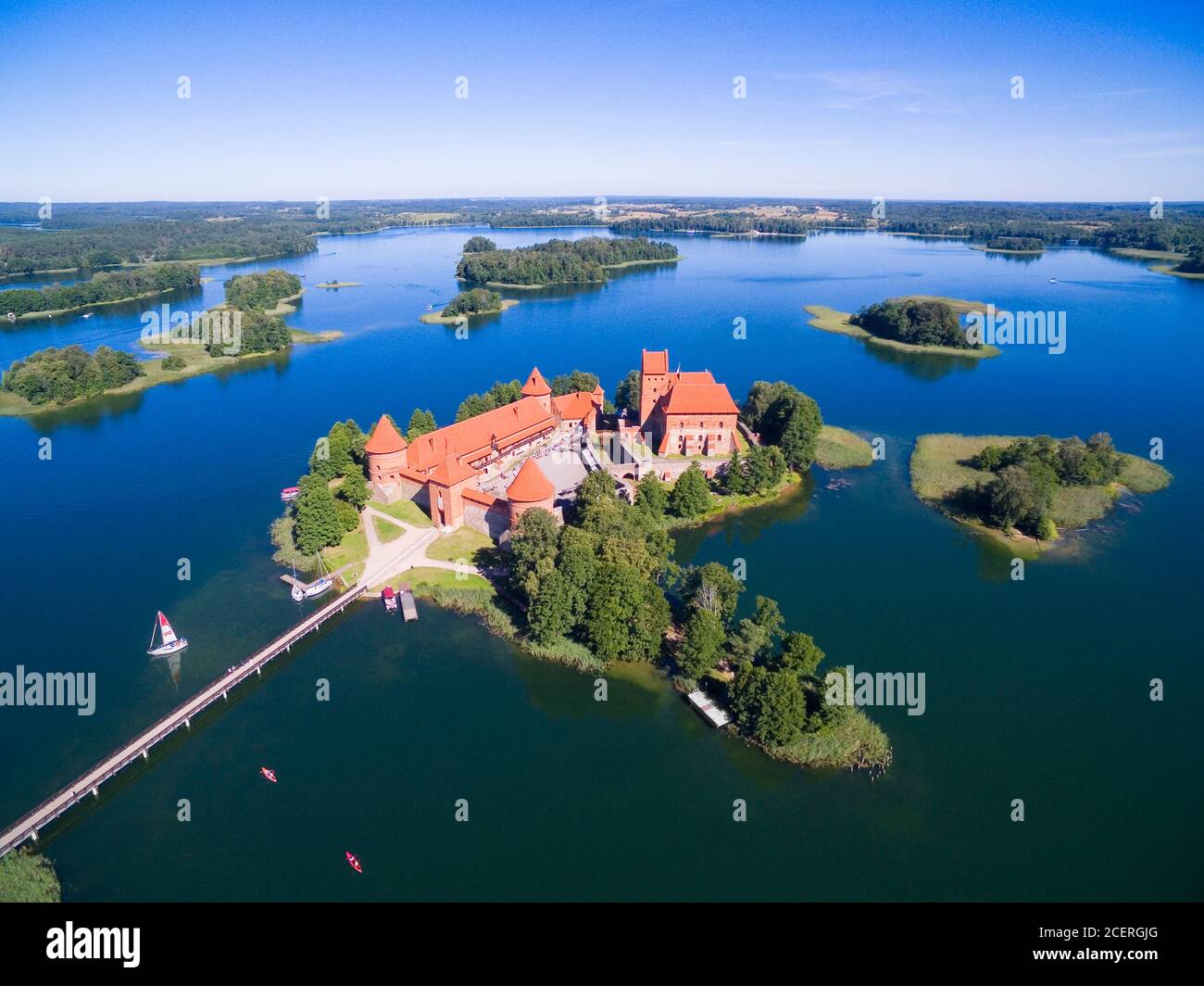 Aerial view of beautiful Gothic style red brick castle on an island on ...