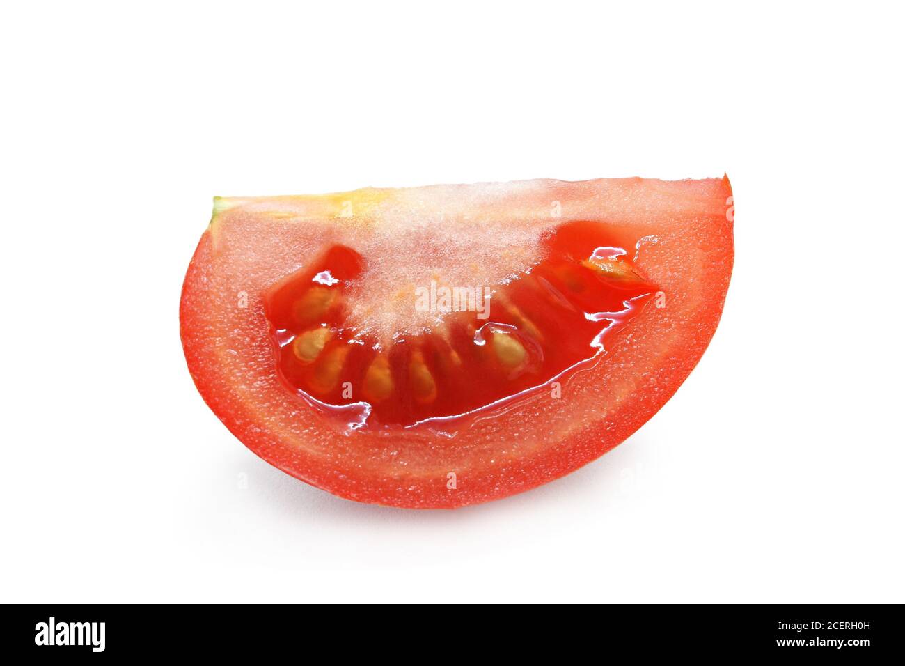 Tomato slice isolated on white background Stock Photo - Alamy