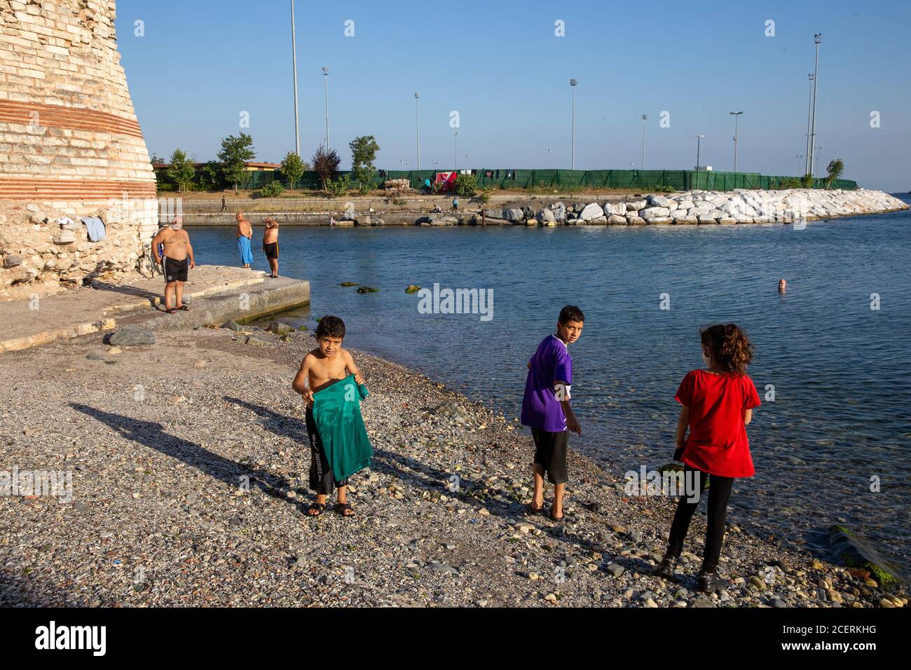 People swimming near the historical Walls of Constantinople in Yenikapi ...