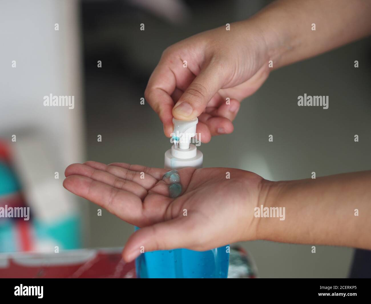 Pushing Gel drops on hand Woman holding gel Hand Sanitizer, gel ...