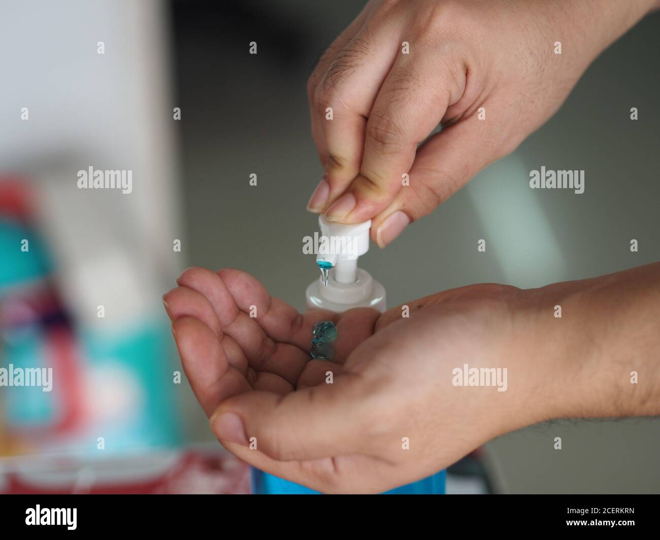 Pushing Gel drops on hand Woman holding gel Hand Sanitizer, gel ...
