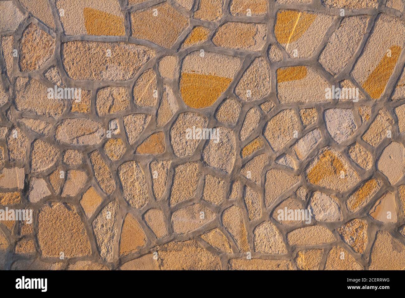 Stone wall texture background - grey stone siding with different sized ...