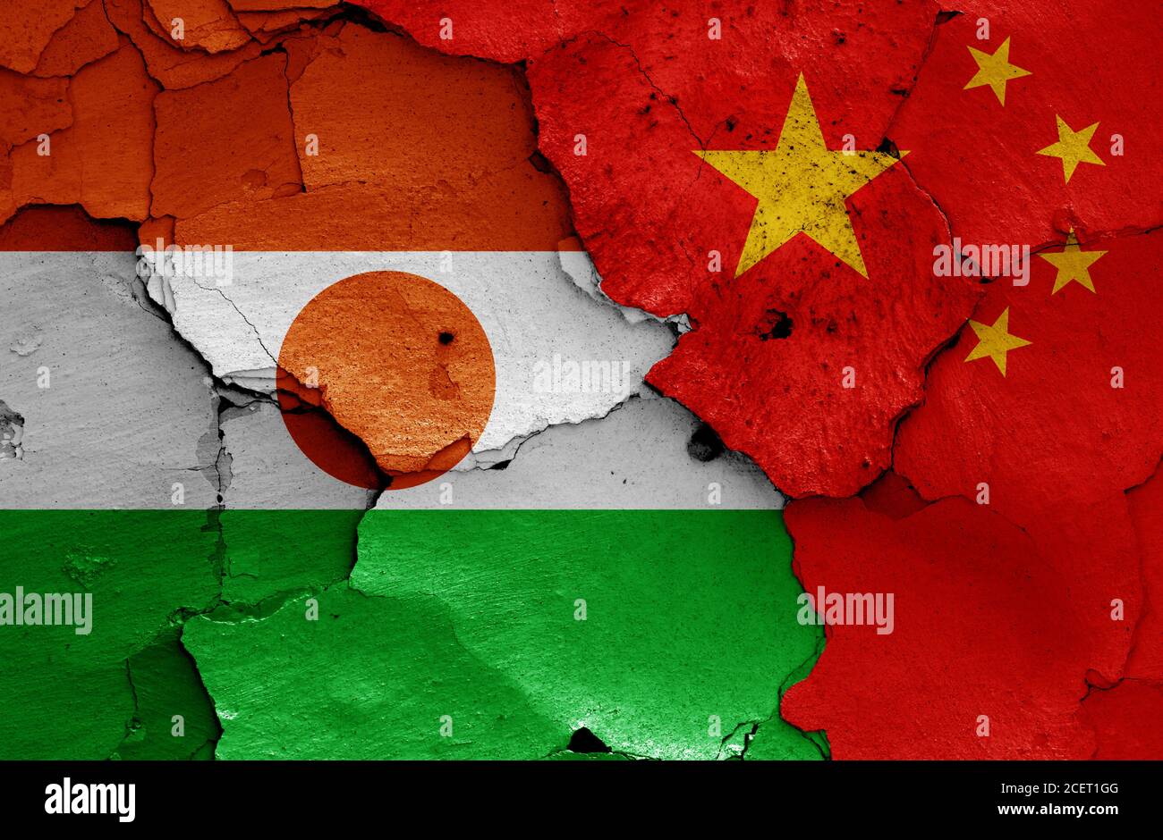 flags of Niger and China painted on cracked wall Stock Photo - Alamy