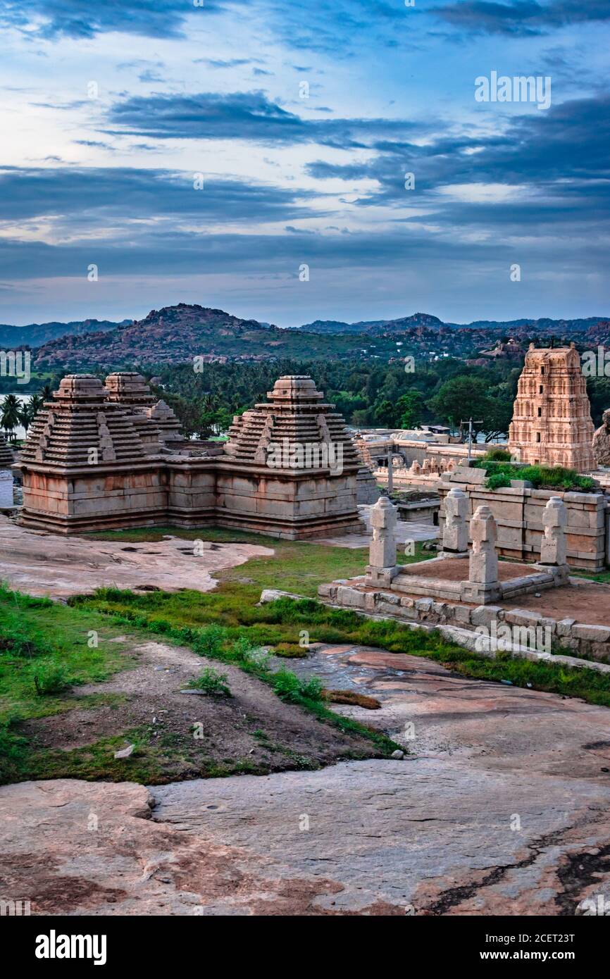 hampi ruins ancient stone art with dramatic sky flat angle shot is ...