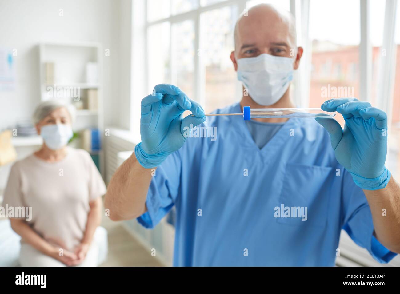 Doctor and patient from behind hi-res stock photography and images - Alamy