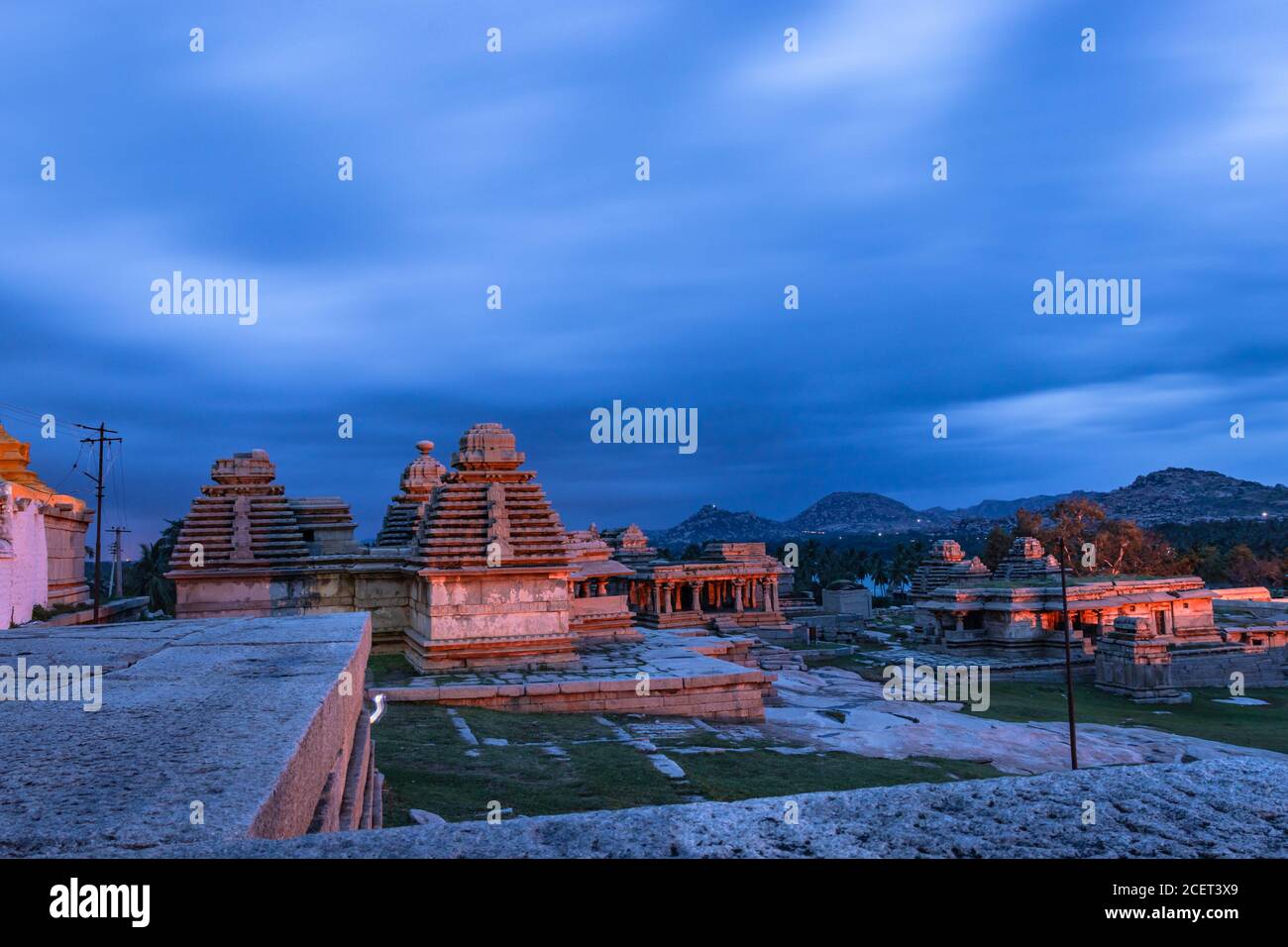 hampi ruins ancient stone art with dramatic sky flat angle shot is ...