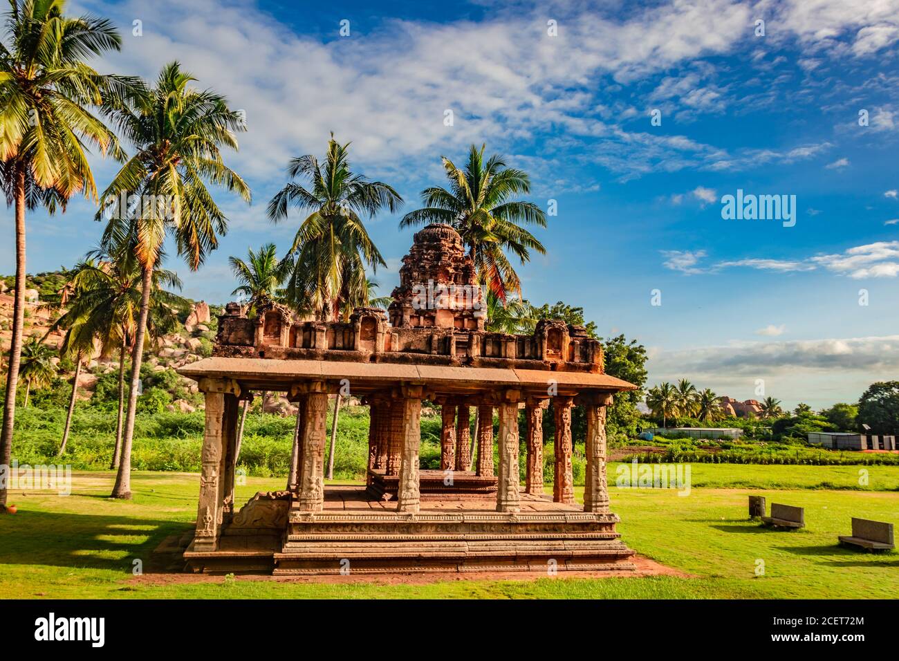 hampi ruins ancient breathtaking stone art with bright blue sky flat ...
