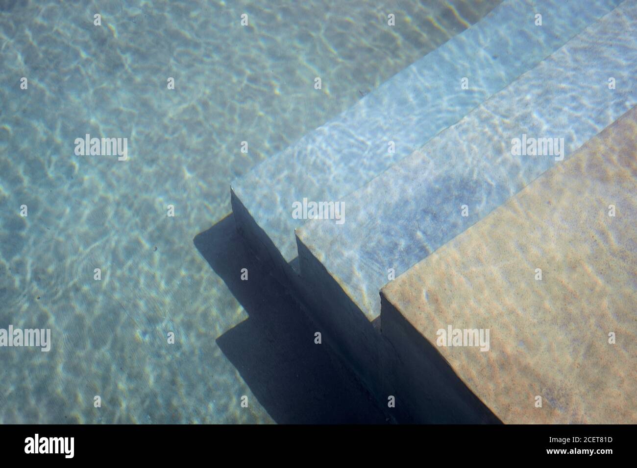 Swimming pool view, detail of the stairs going into the water Stock ...
