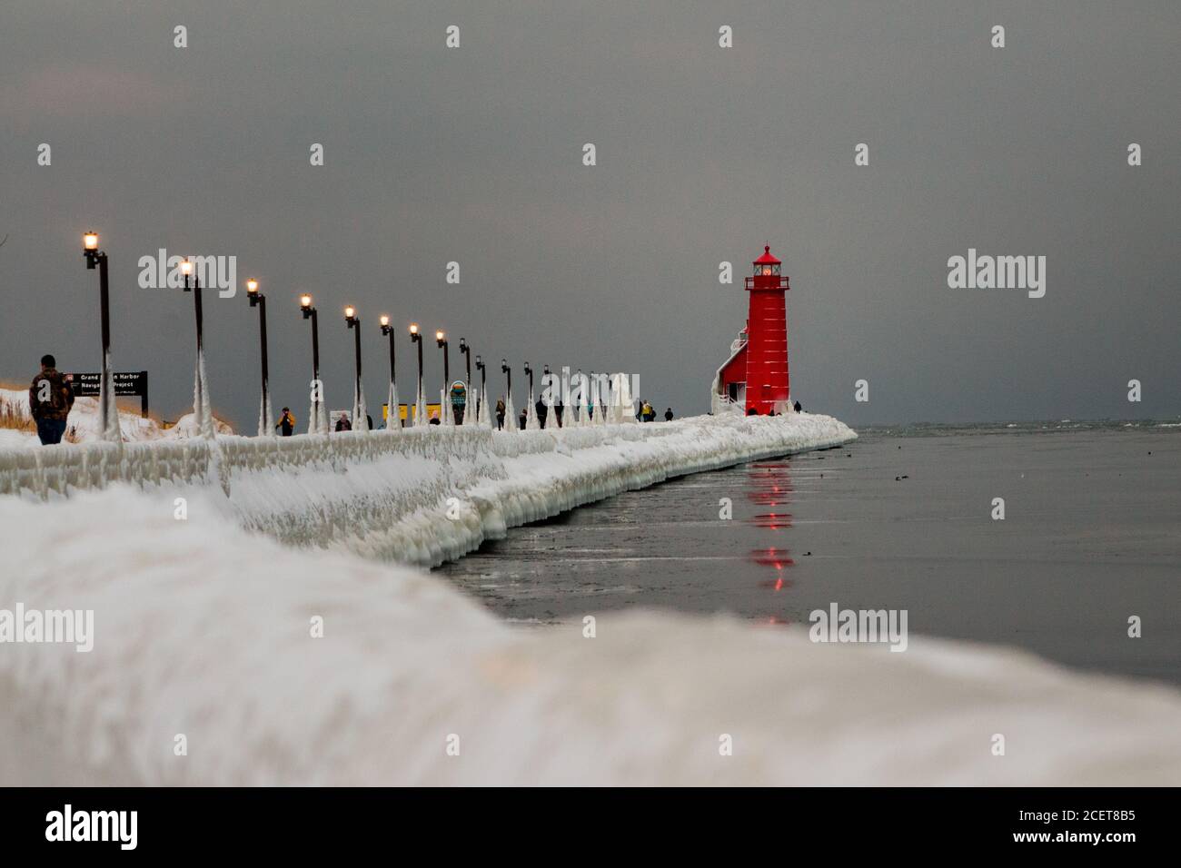 The lighthouse at Grand Haven Michigan frozen over Stock Photo - Alamy