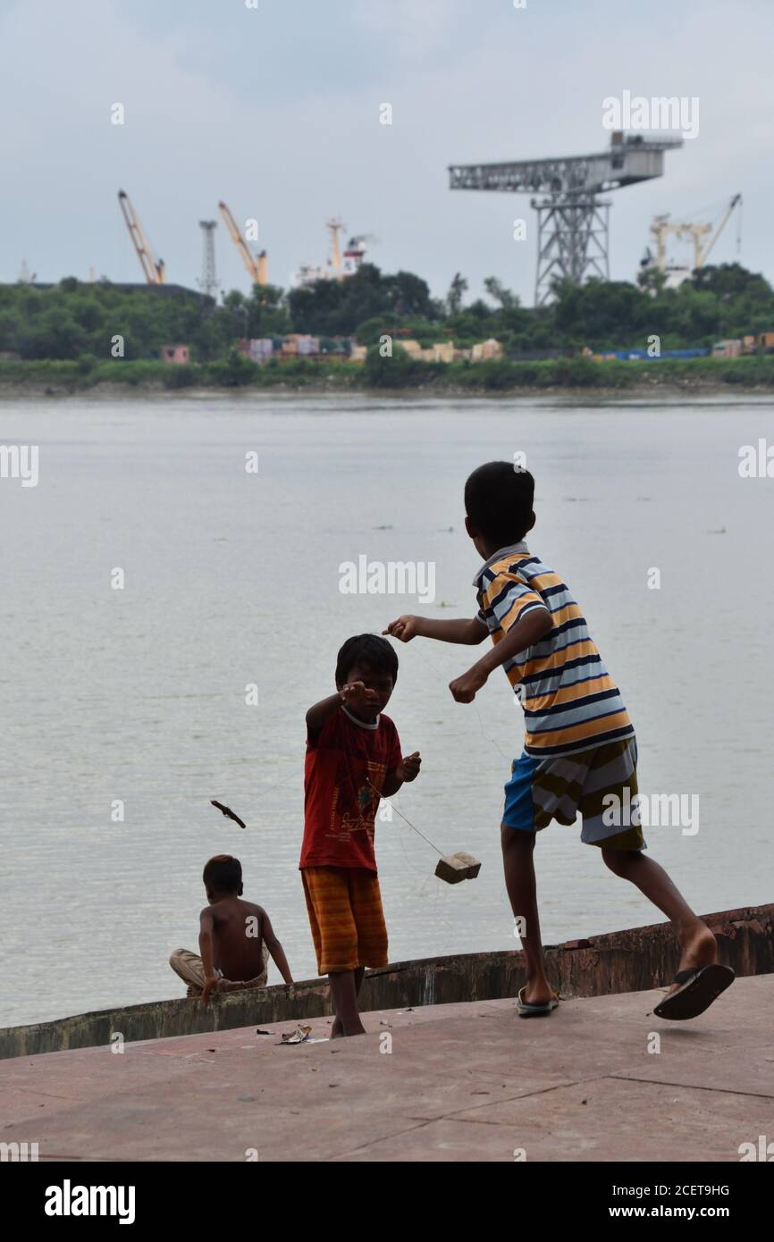 Kolkata, India. 02nd Sep, 2020. Children are playing dangerously at ...