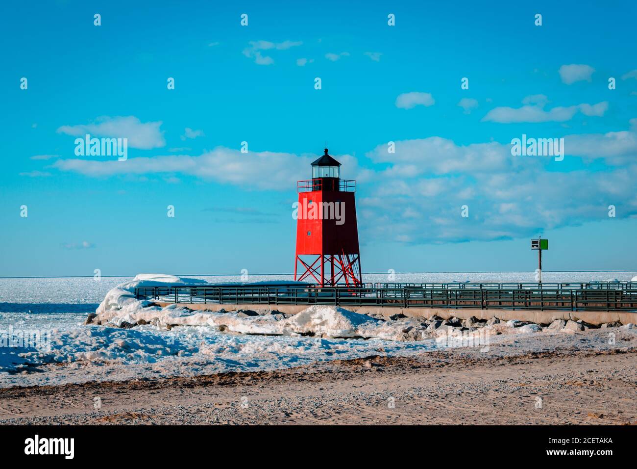 A look at Lake Michigan and the South Pier Lighthouse in Charlevoix ...