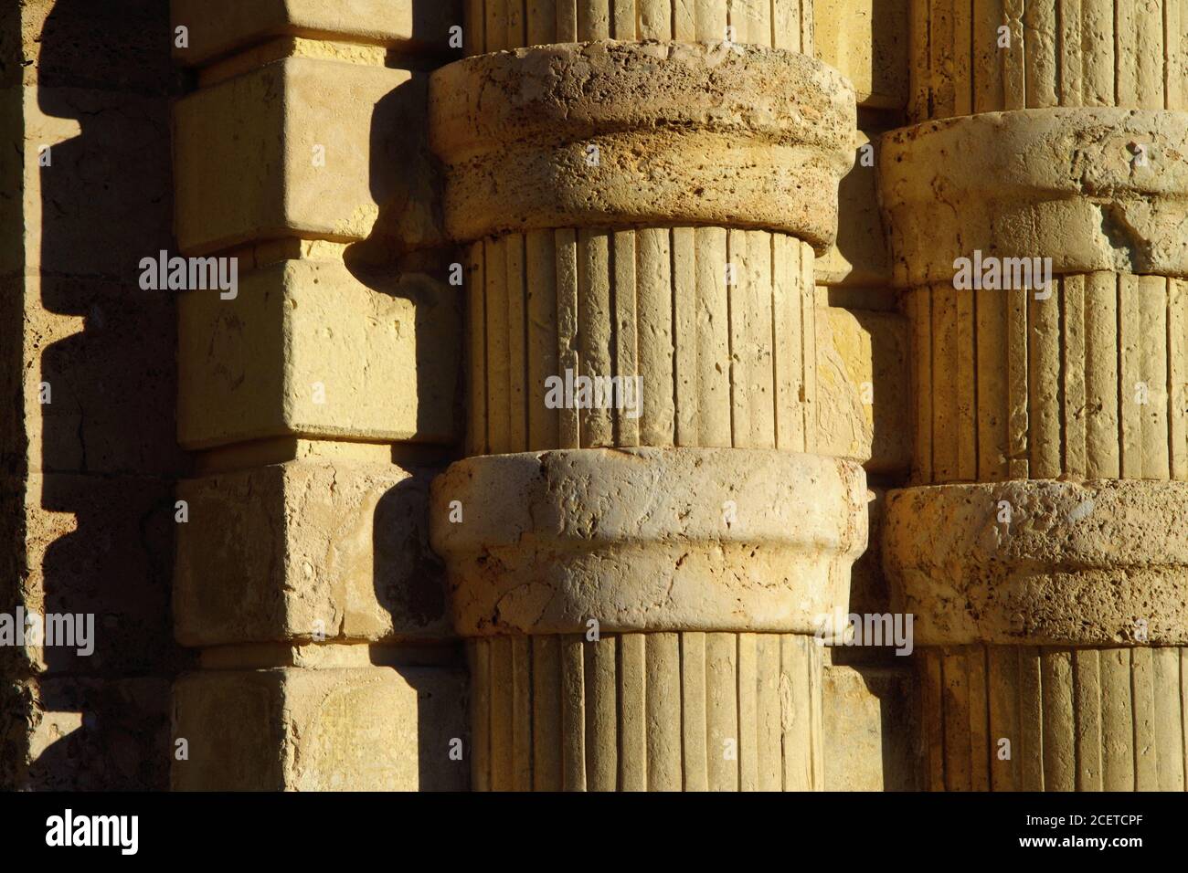 Limestone building detail in harsh daylight with clearly defined ...